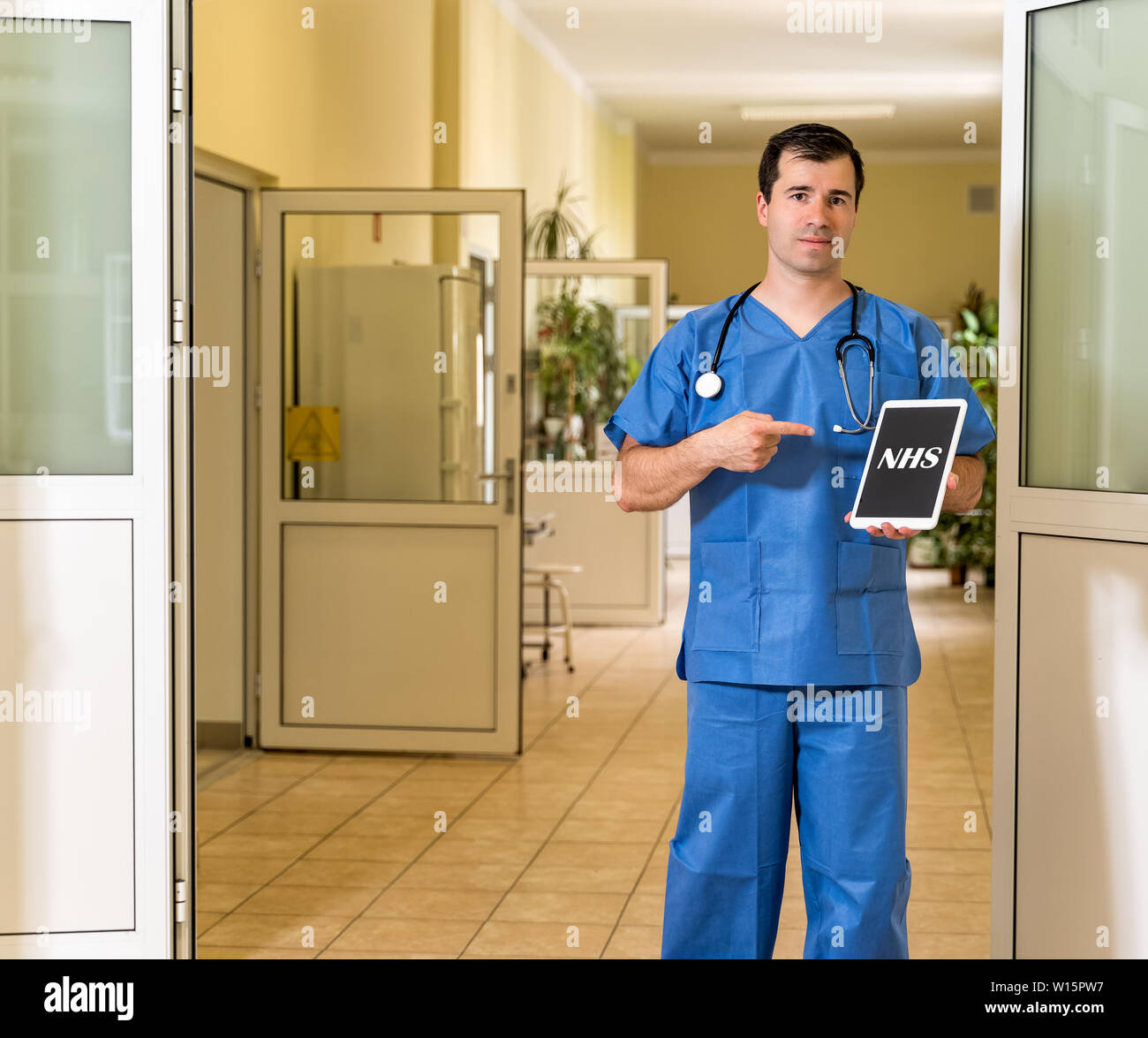 Nhs doctor hospital corridor hi-res stock photography and images - Alamy