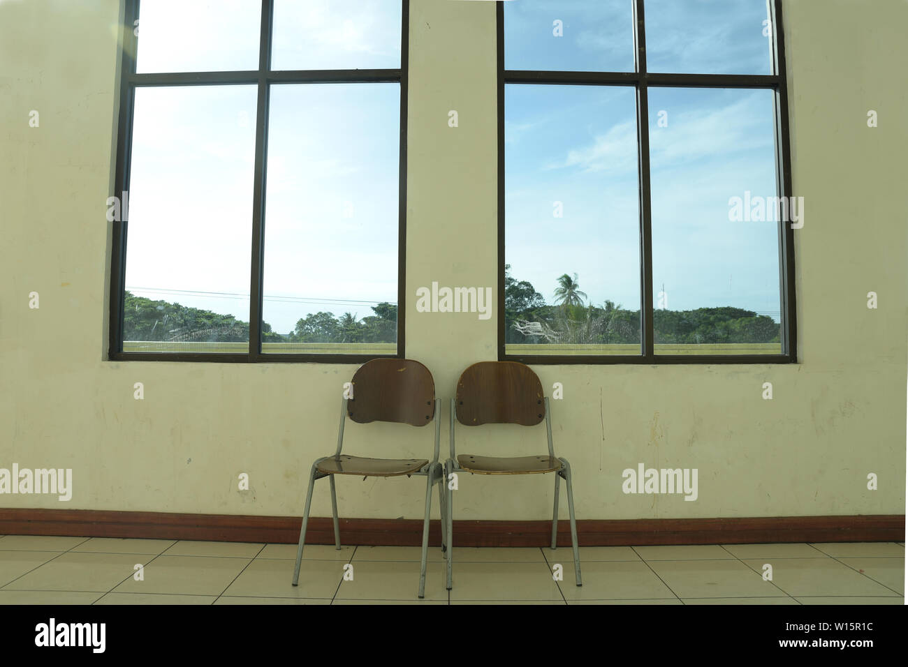 Old vintage two Chairs with beautiful window views Stock Photo - Alamy
