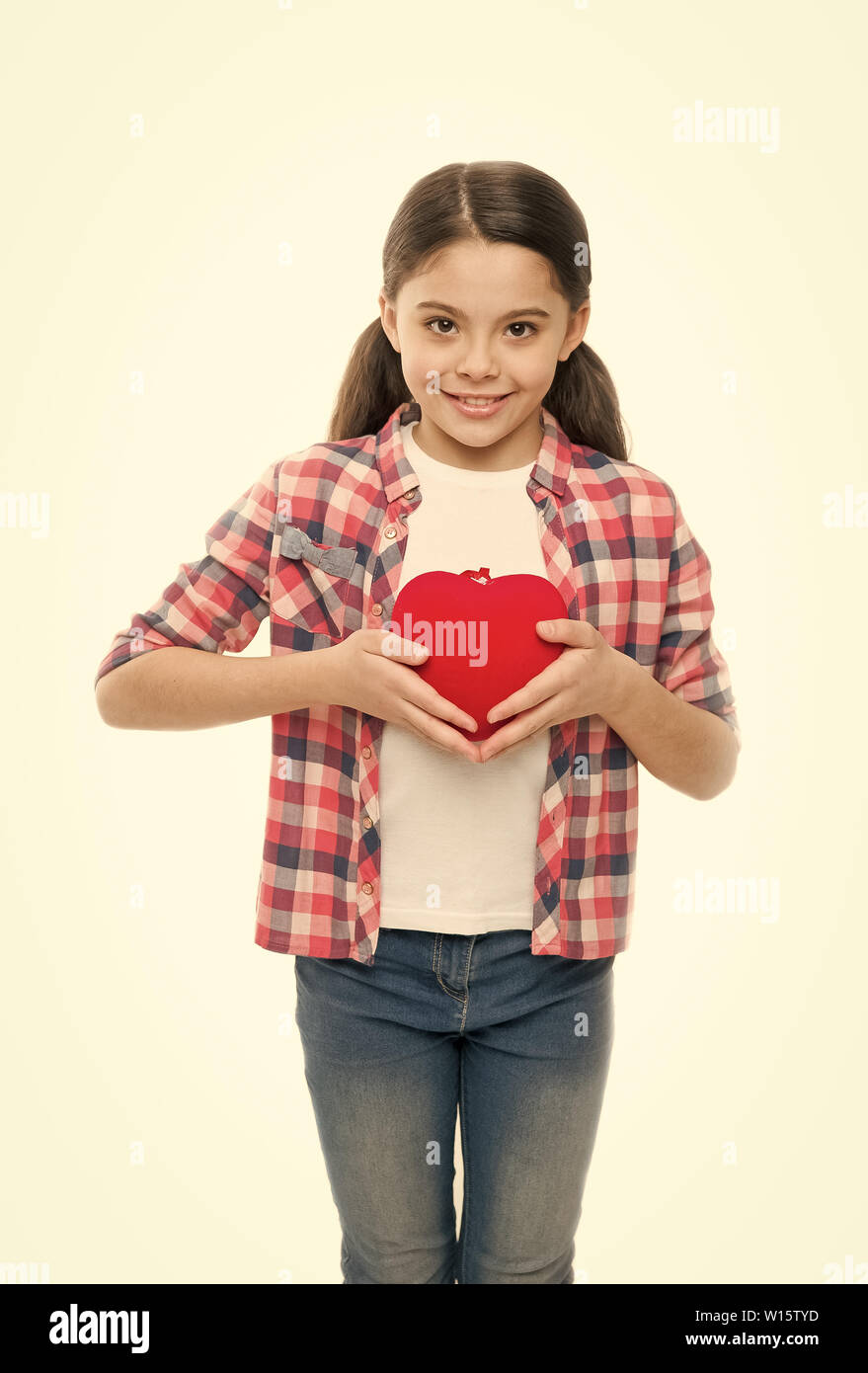 Her heart beating with love. Little child expressing love on valentines ...