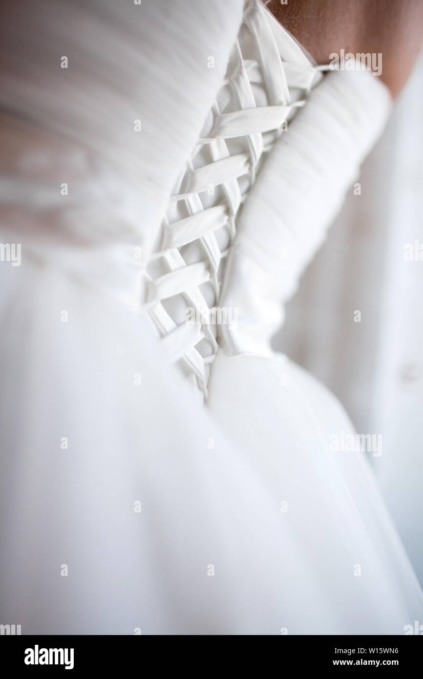 Bride from the back in a wedding dress Stock Photo - Alamy