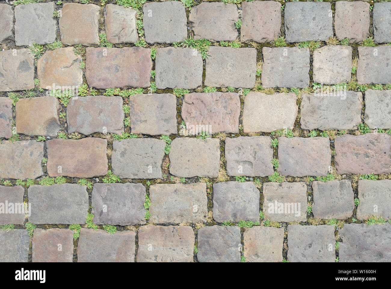 Old cobblestone road of big stones Stock Photo - Alamy