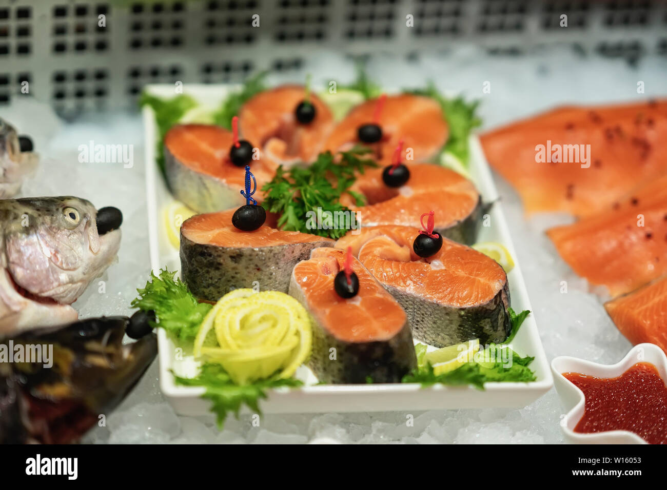 Pieces of salmon to portions on ice in farmers bazaar, Sale of fresh ...