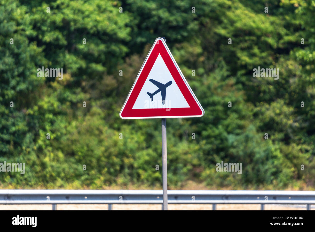 airplanes crossing street sign Stock Photo - Alamy