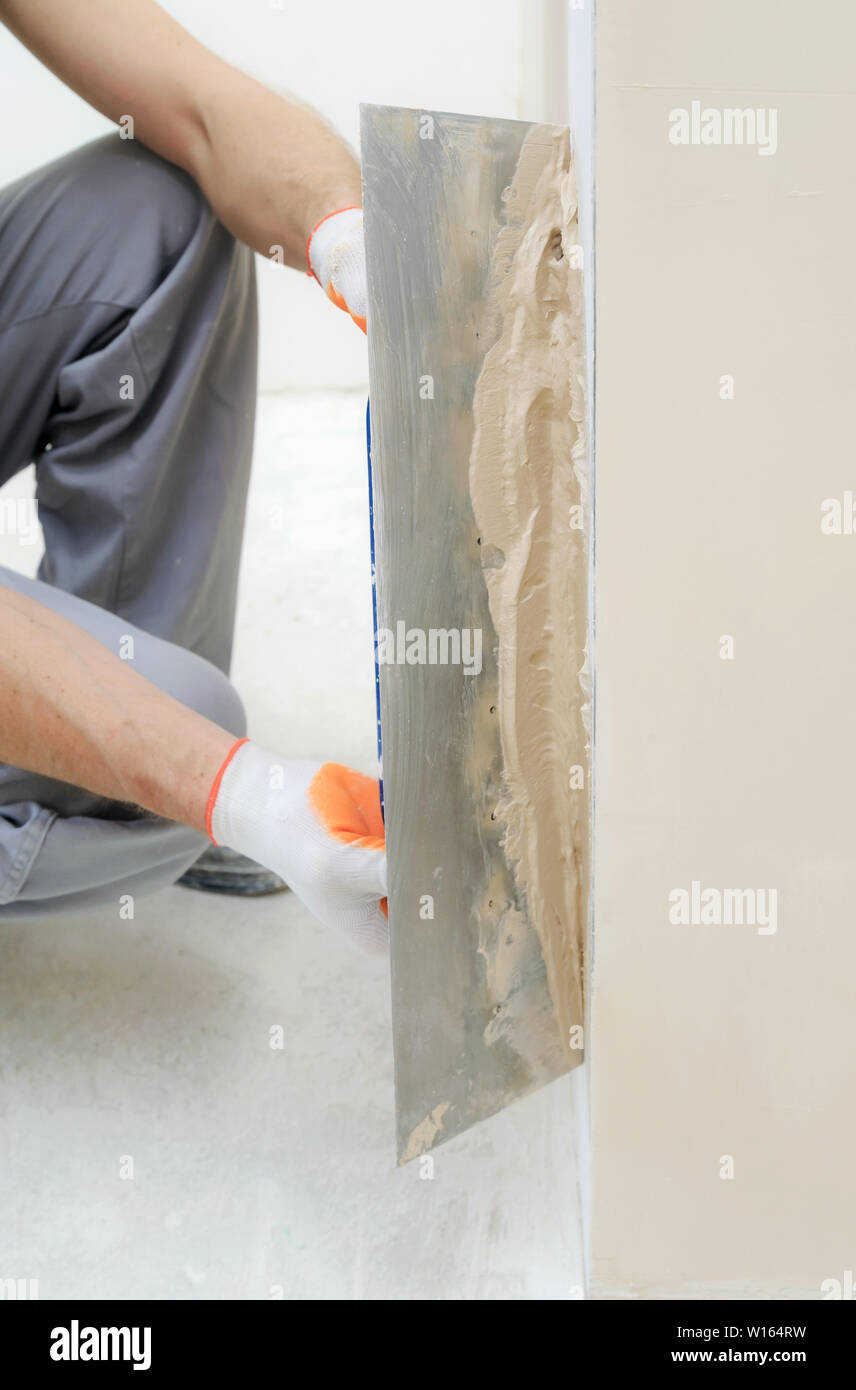 Long trowel hi-res stock photography and images - Alamy