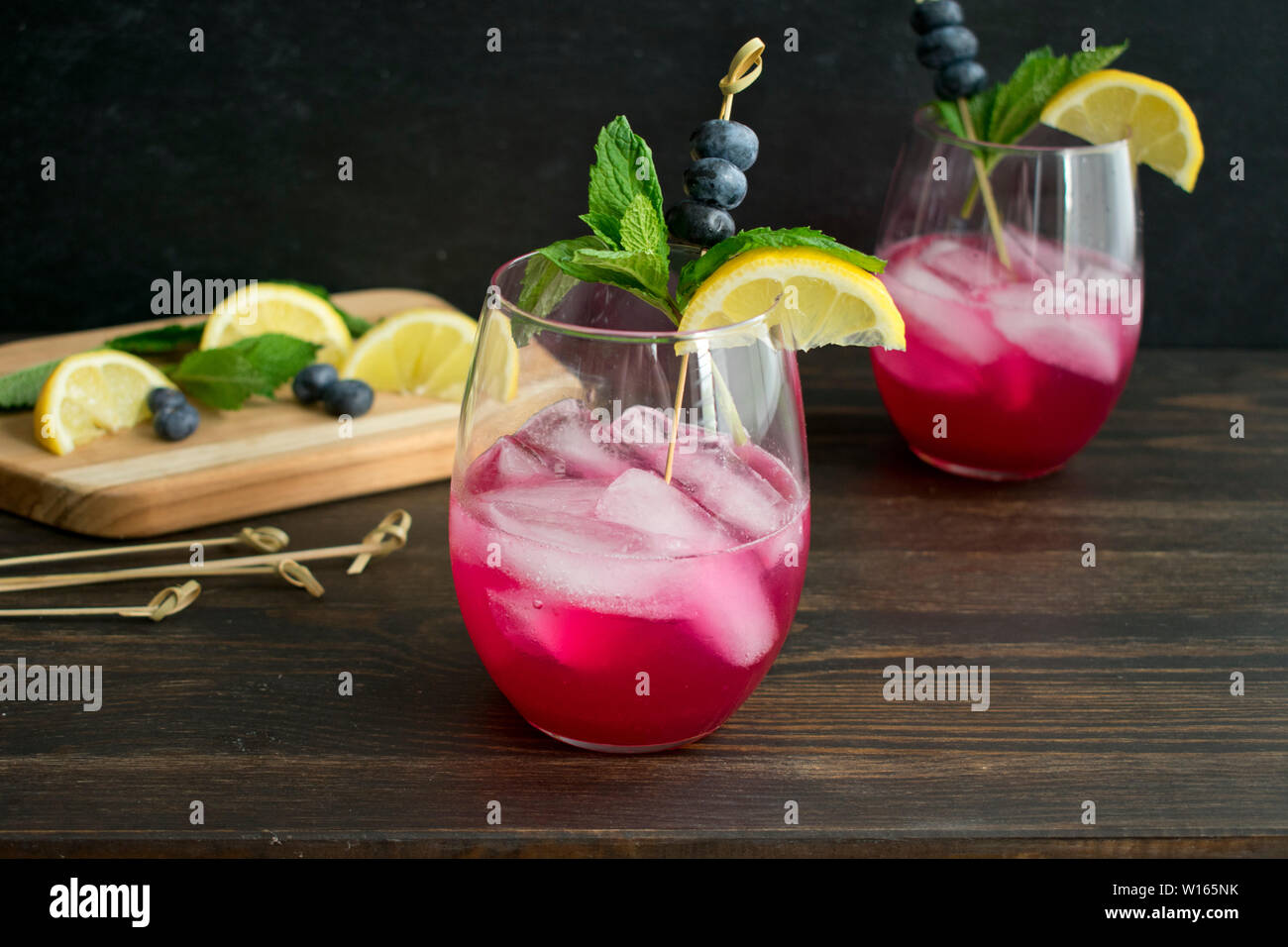 Sparkling Blueberry Lemonade with Garnish Stock Photo - Alamy
