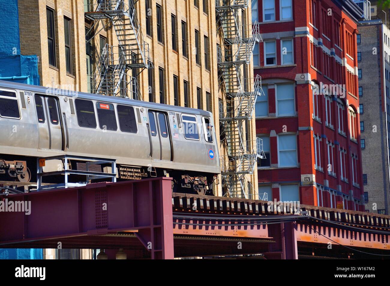 Chicago, Illinois, USA. A CTA Orange Line rapid transit train entering ...