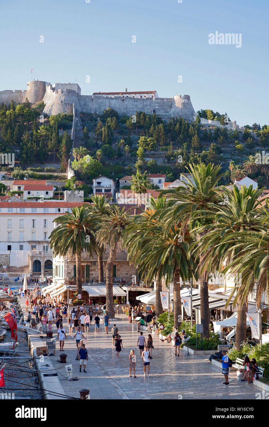A medieval fortress complete with extensive walls dominates the seaport ...