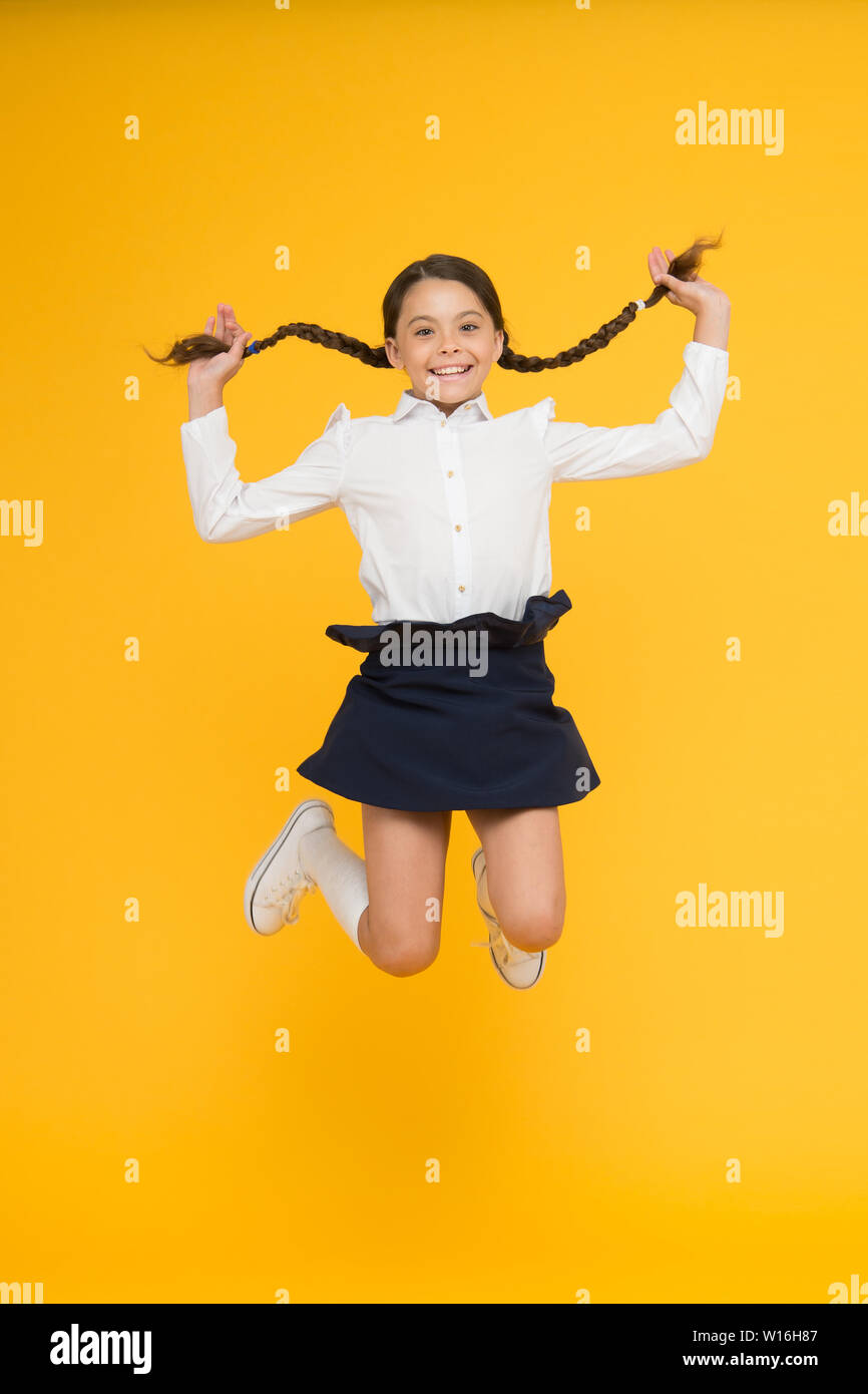 happy child jumping in school uniform. having fun. time for fun. school ...
