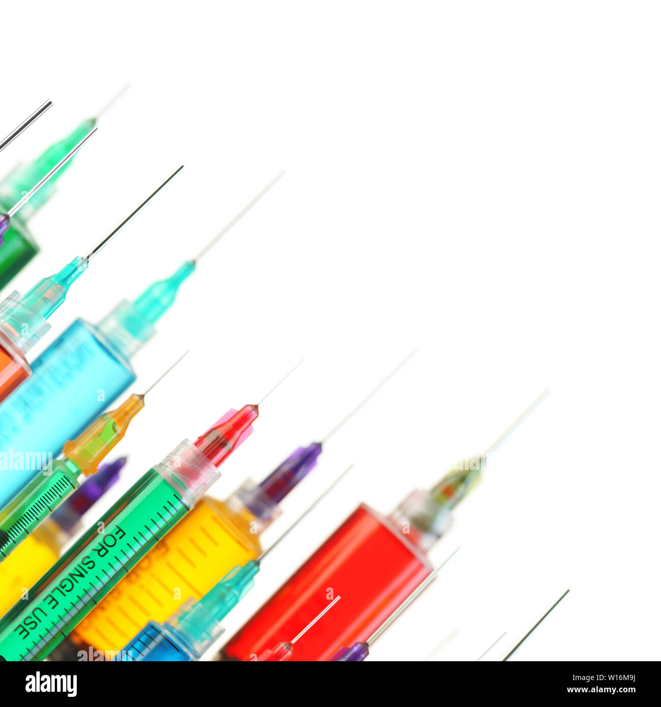 Collection of bright and colorful syringes Stock Photo - Alamy