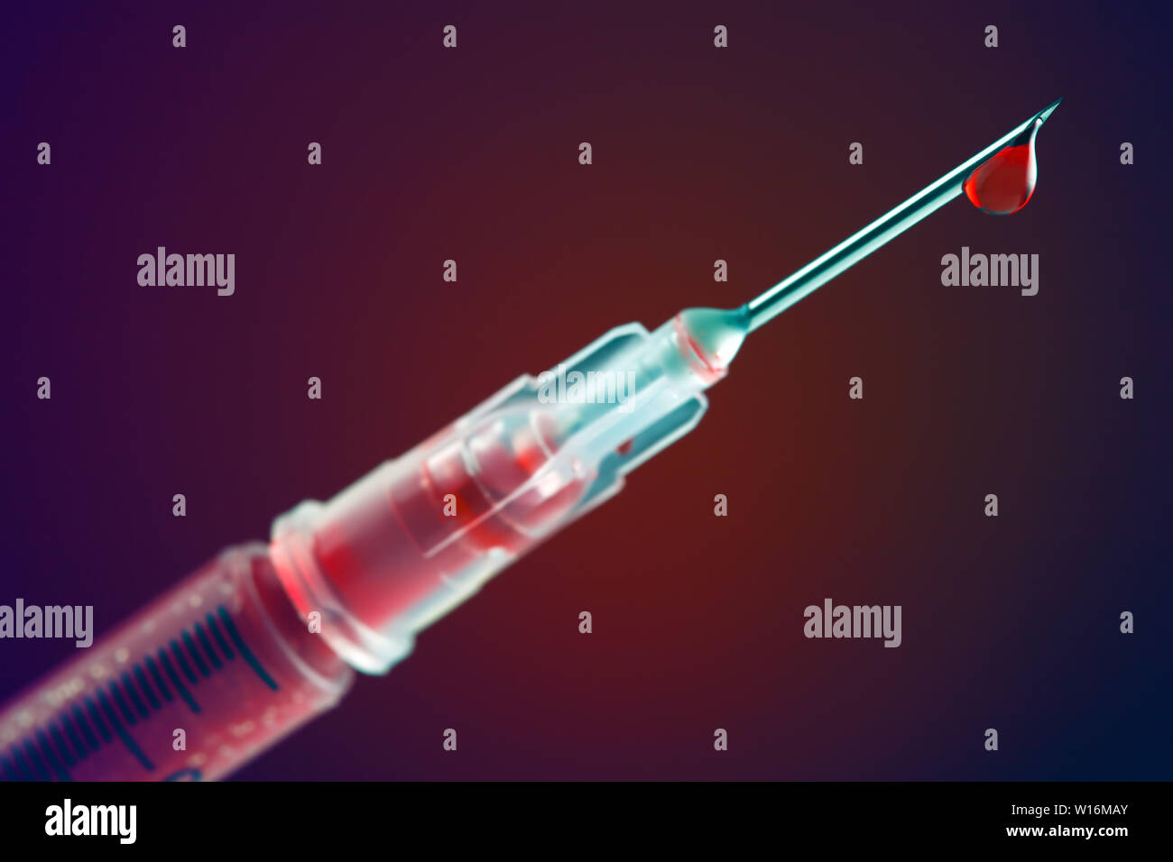 Sharp syringe leaking blood Stock Photo - Alamy