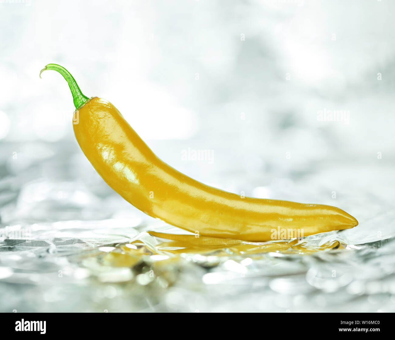 Shiny fresh yellow Chili pepper Stock Photo - Alamy