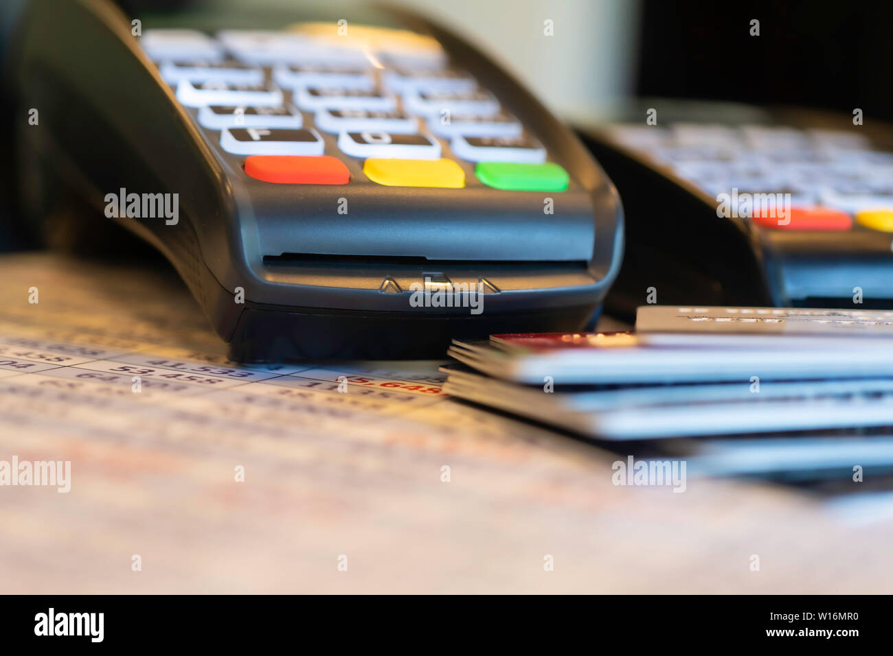 Credit Card Machine on spreadsheet with credit cards Stock Photo - Alamy