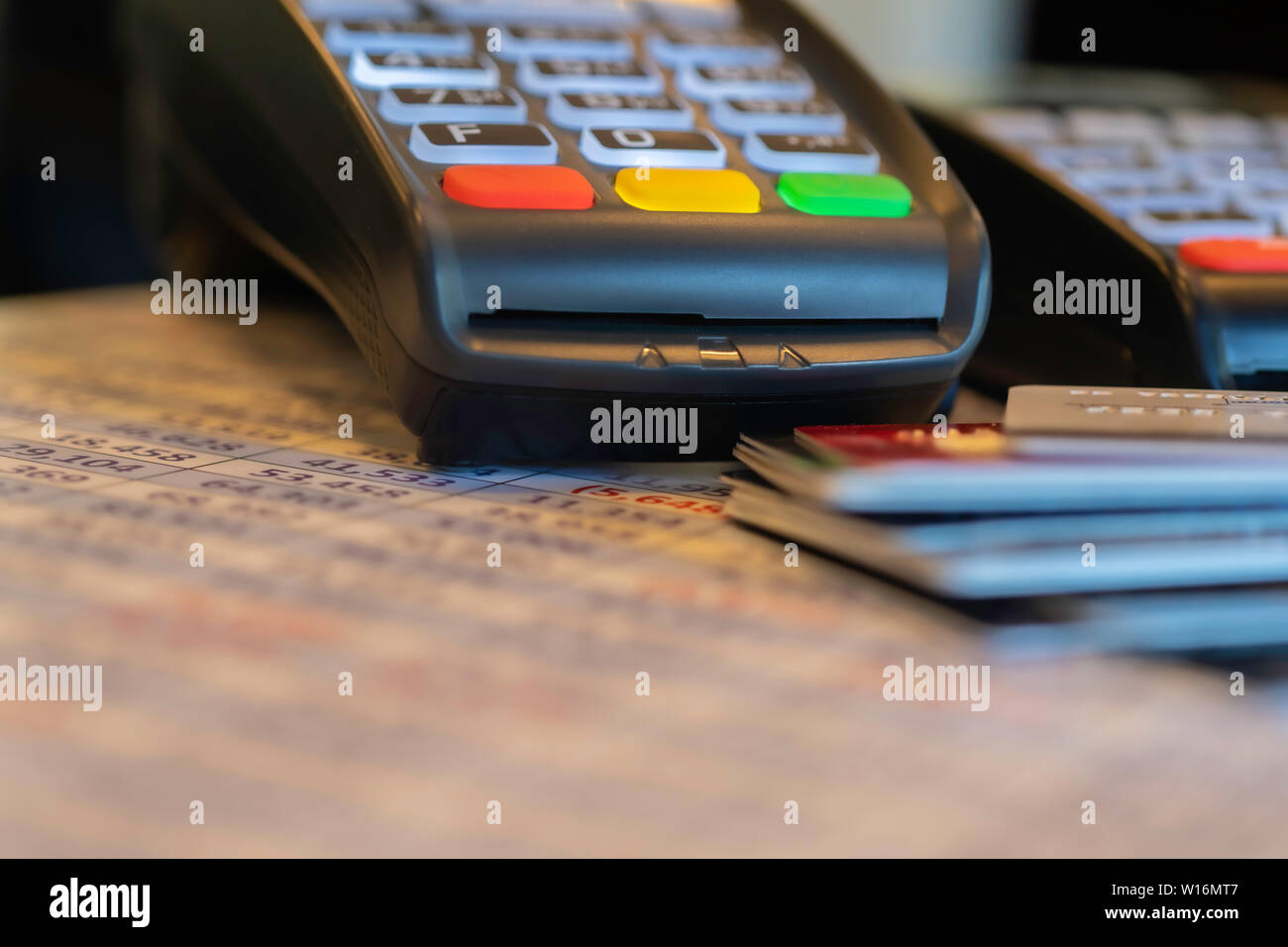 Credit Card Machine on spreadsheet with credit cards Stock Photo - Alamy