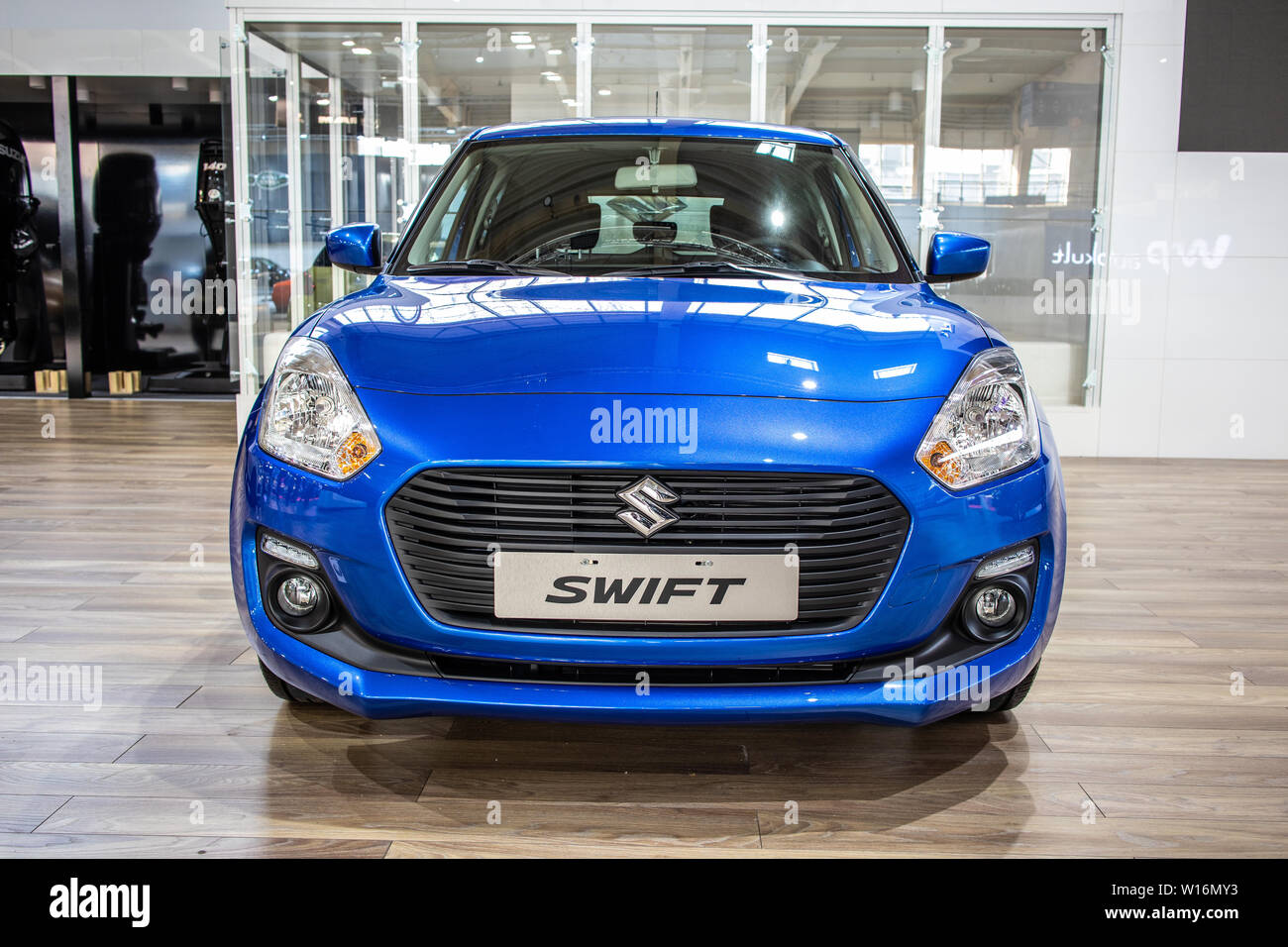 Poznan, Poland, March 2019: blue new Suzuki Swift, Poznan International ...