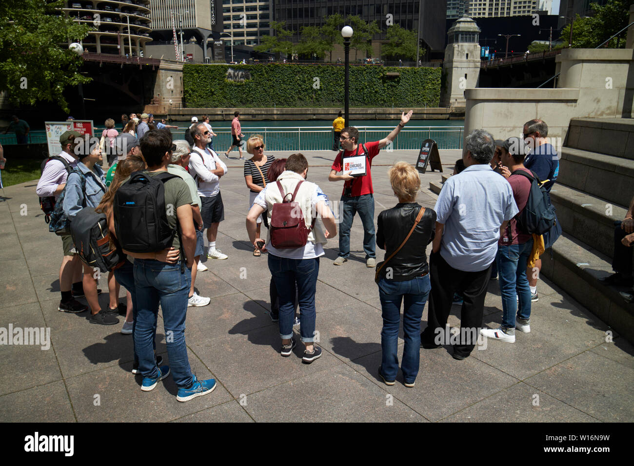 Group visitors on city walking tour hi-res stock photography and images ...