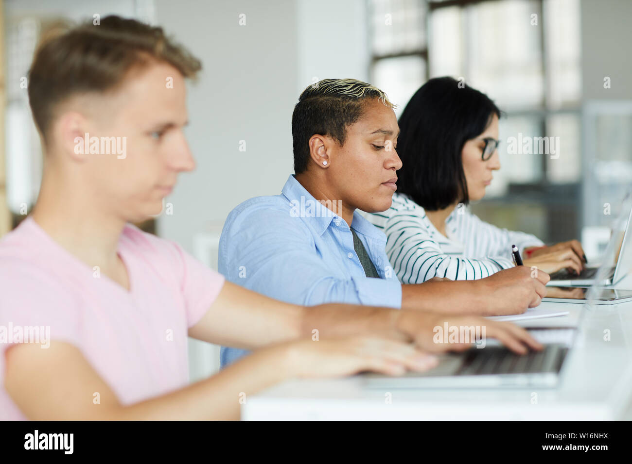 Concentrated group people working hi-res stock photography and images ...
