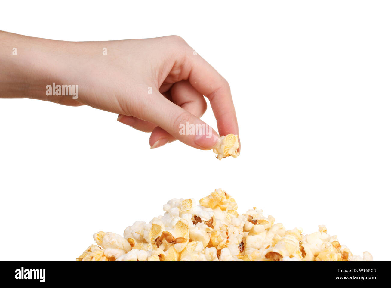 hand picking a tasty popcorn Stock Photo - Alamy