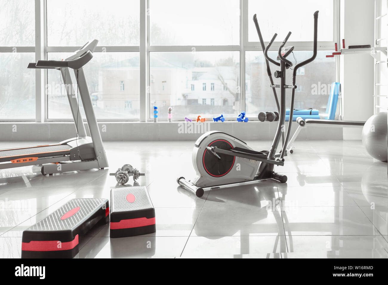 Interior of gym with modern equipment Stock Photo - Alamy