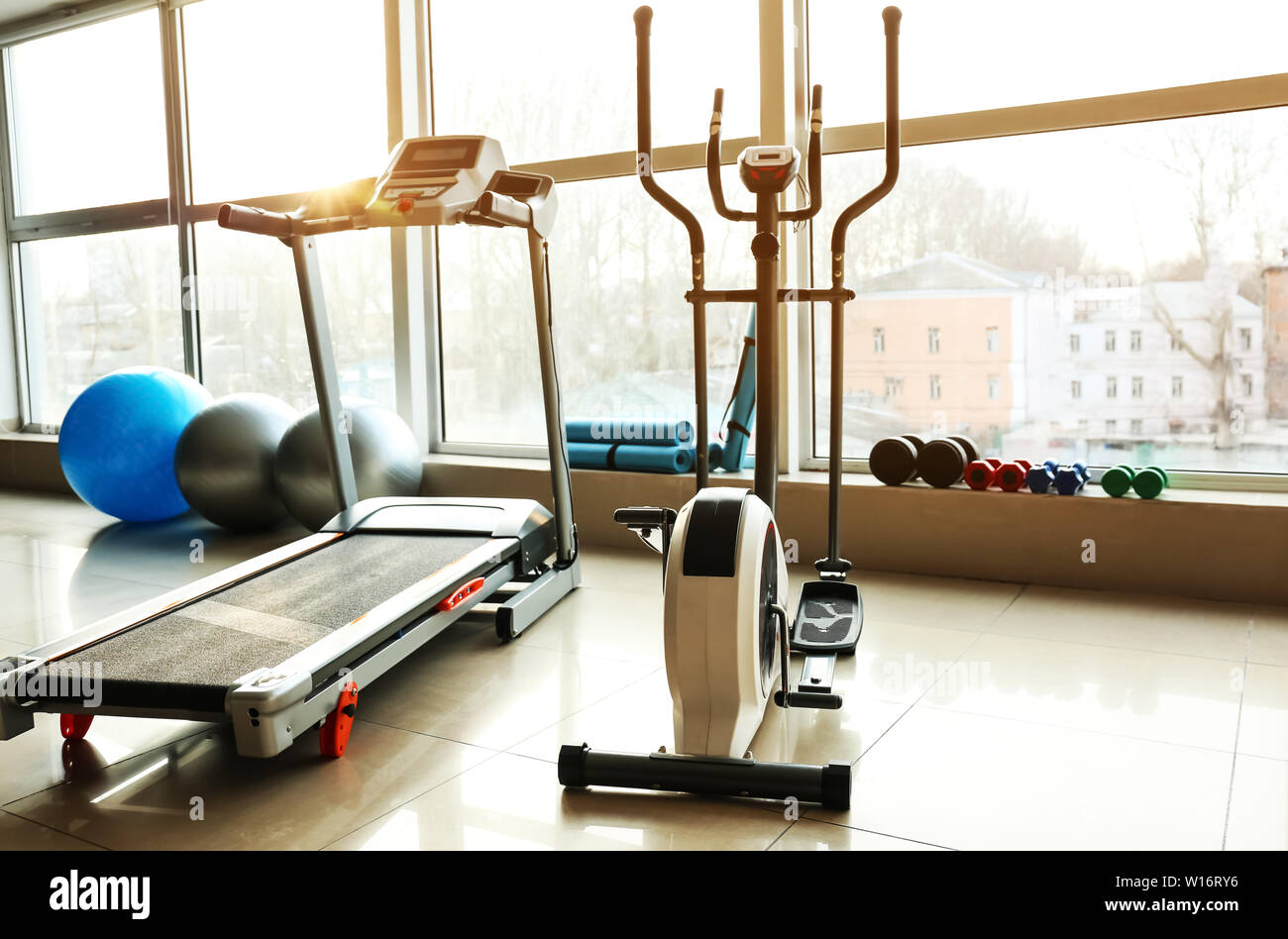 Interior of gym with modern equipment Stock Photo - Alamy
