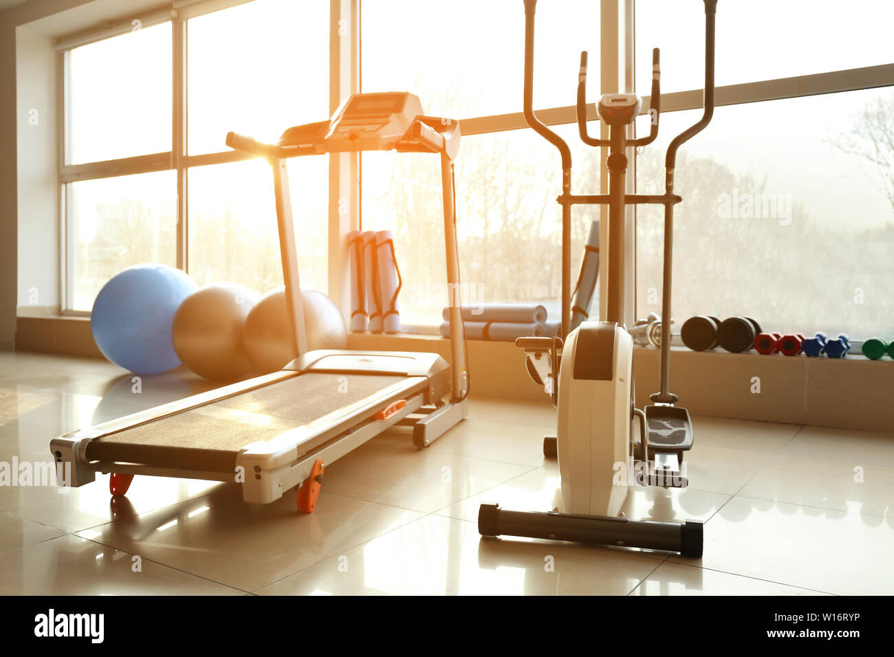 Interior of gym with modern equipment Stock Photo - Alamy