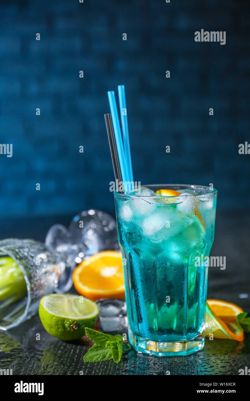 Glass of Blue Lagoon cocktail on table in bar Stock Photo - Alamy