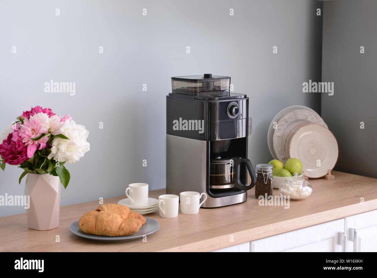 Modern coffee machine in kitchen Stock Photo - Alamy