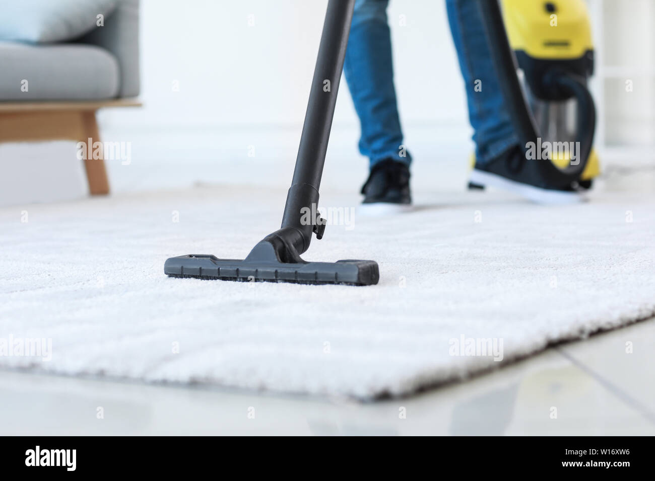 Man hoovering room hi-res stock photography and images - Alamy