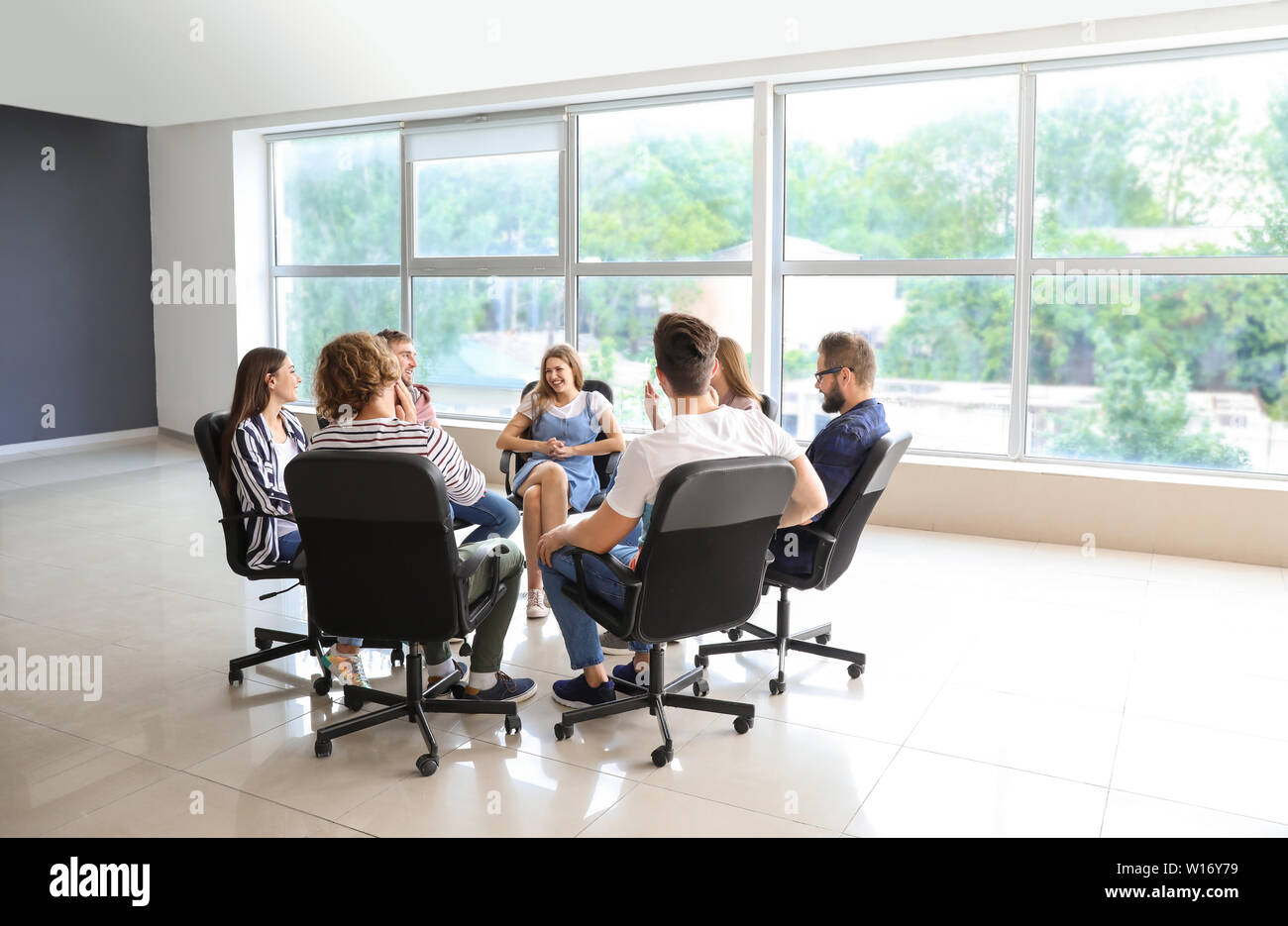 Young people at group therapy session Stock Photo - Alamy