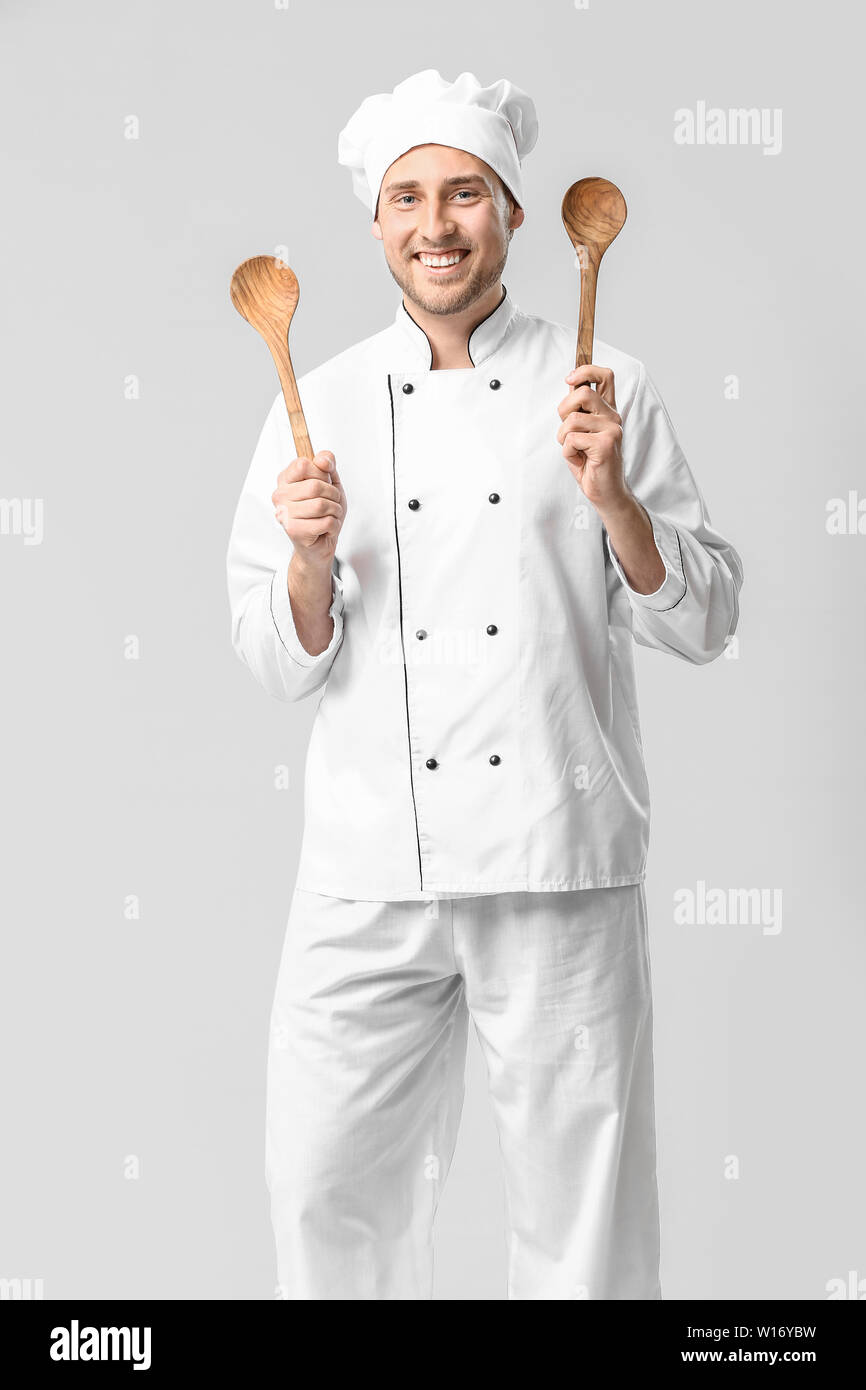 Handsome male chef on white background Stock Photo - Alamy