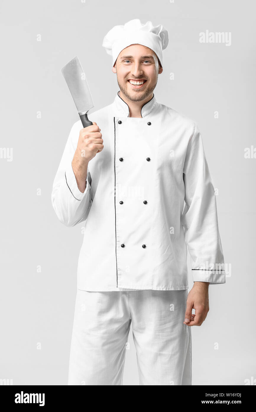 Handsome male chef on white background Stock Photo - Alamy