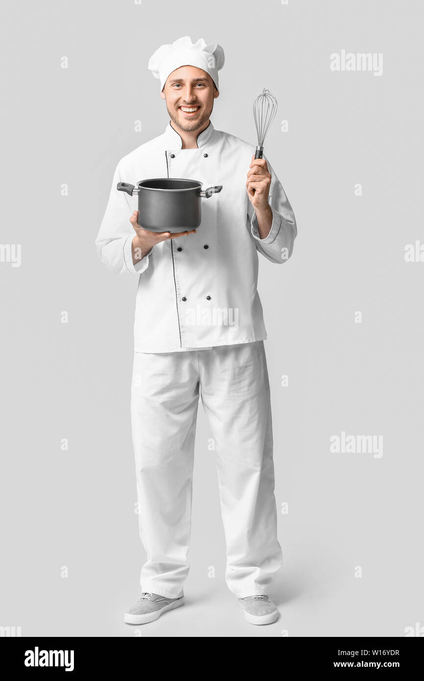 Handsome male chef on white background Stock Photo - Alamy