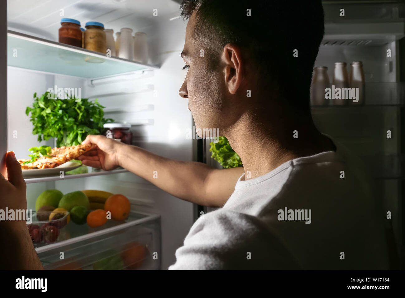 Man night fridge hi-res stock photography and images - Alamy