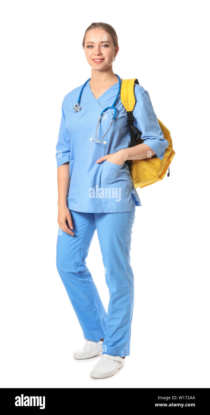 Young medical assistant with backpack on white background Stock Photo ...