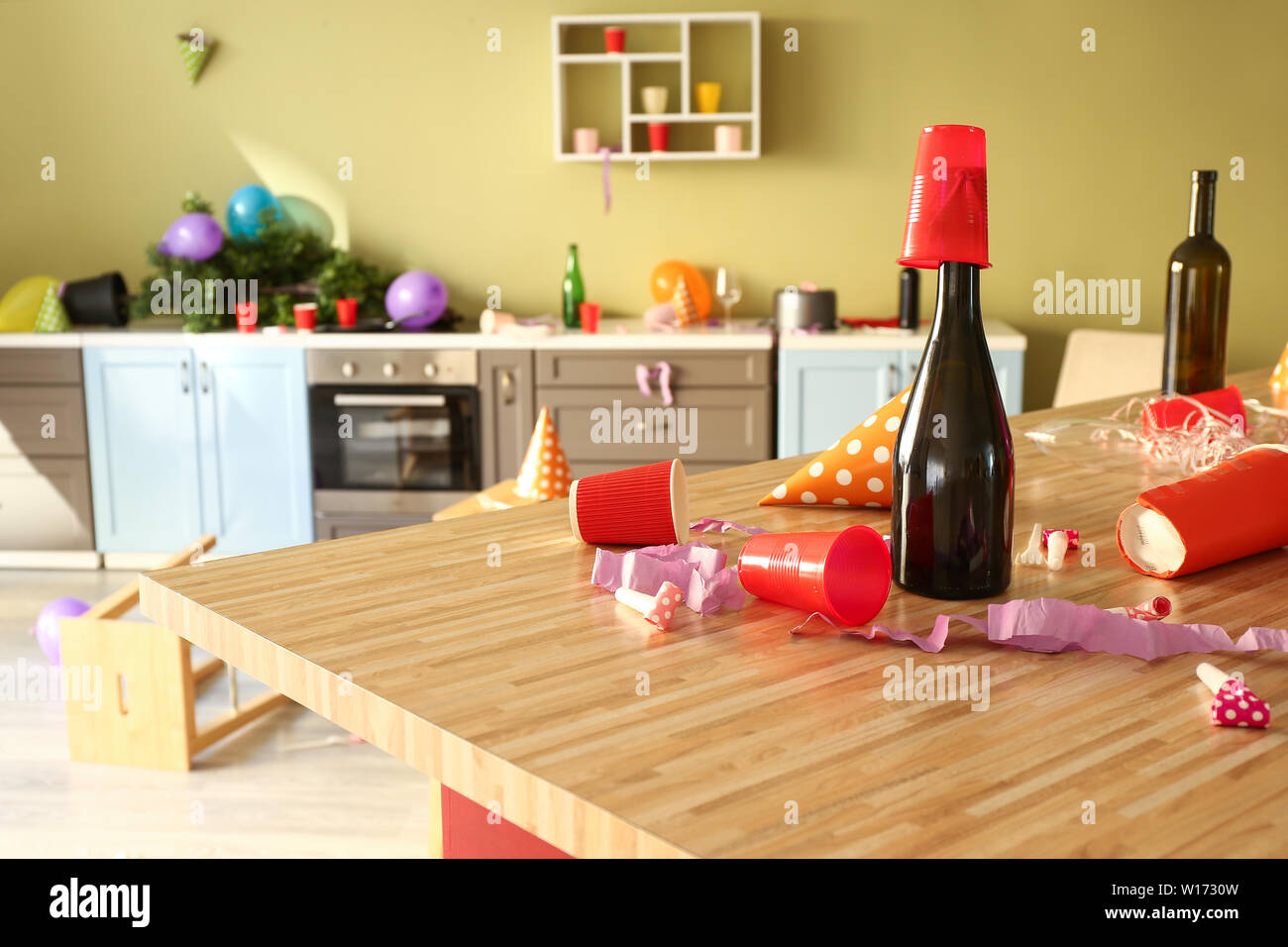 Interior of kitchen after party Stock Photo - Alamy
