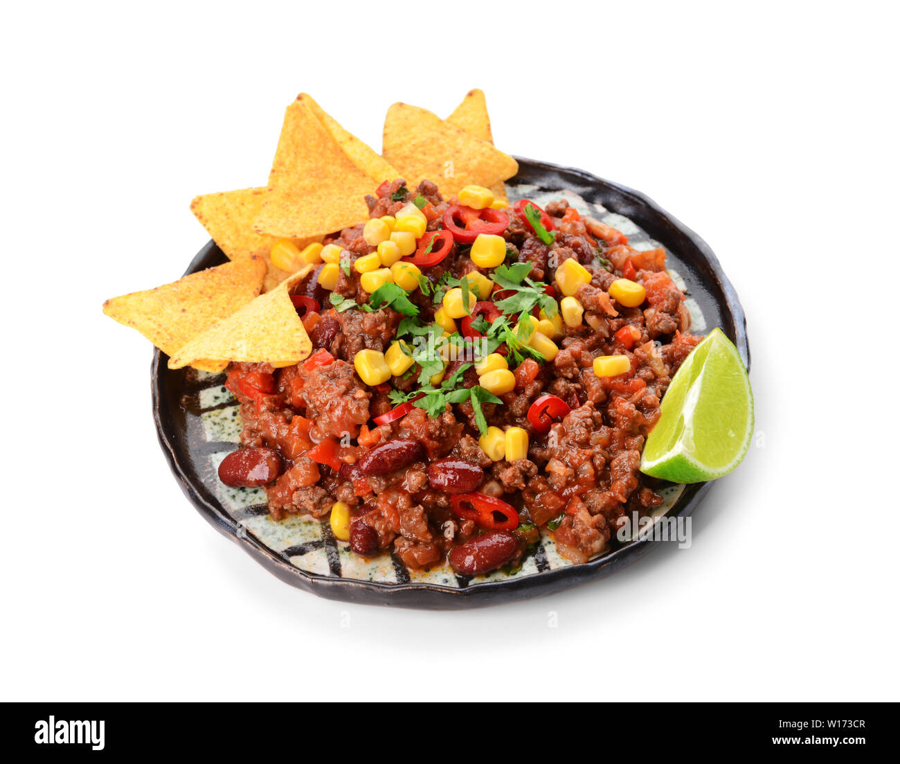 Plate with tasty chili con carne on white background Stock Photo - Alamy
