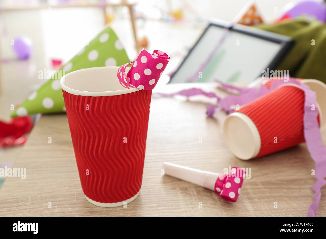 Table with trash in room after party Stock Photo - Alamy