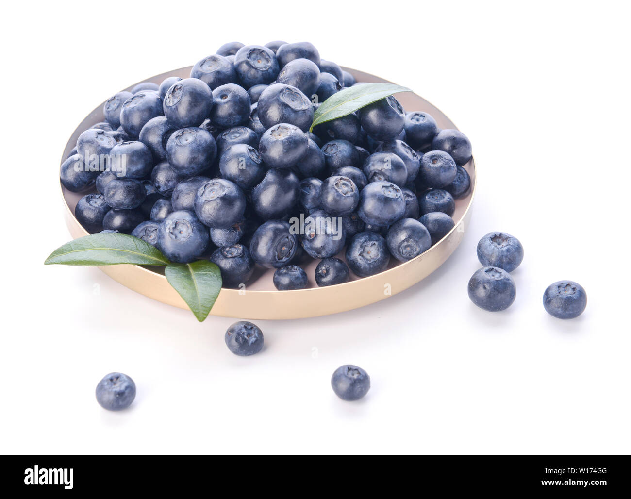 Plate with ripe blueberry on white background Stock Photo - Alamy