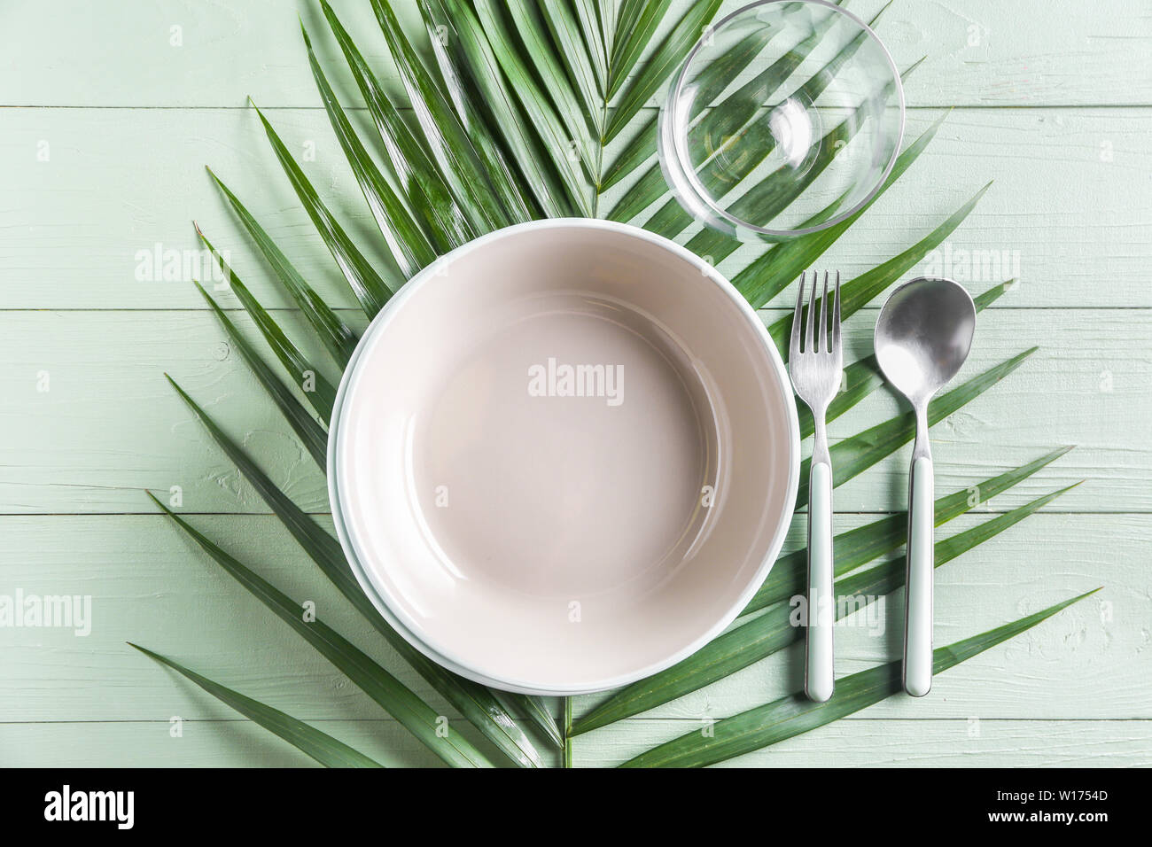 Beautiful table setting with floral decor on wooden background Stock ...