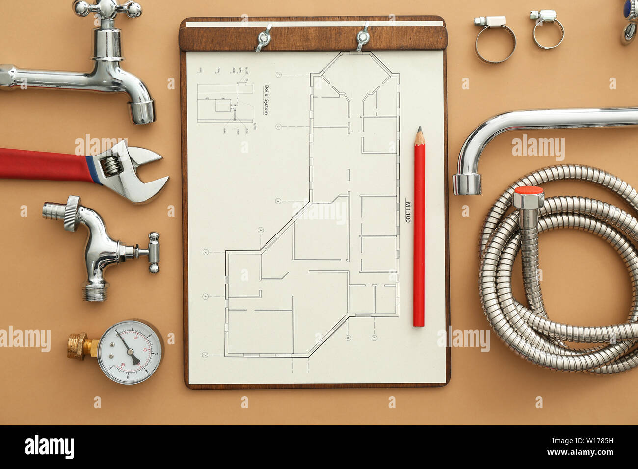 Set of plumbing items with house plan on color background Stock Photo ...
