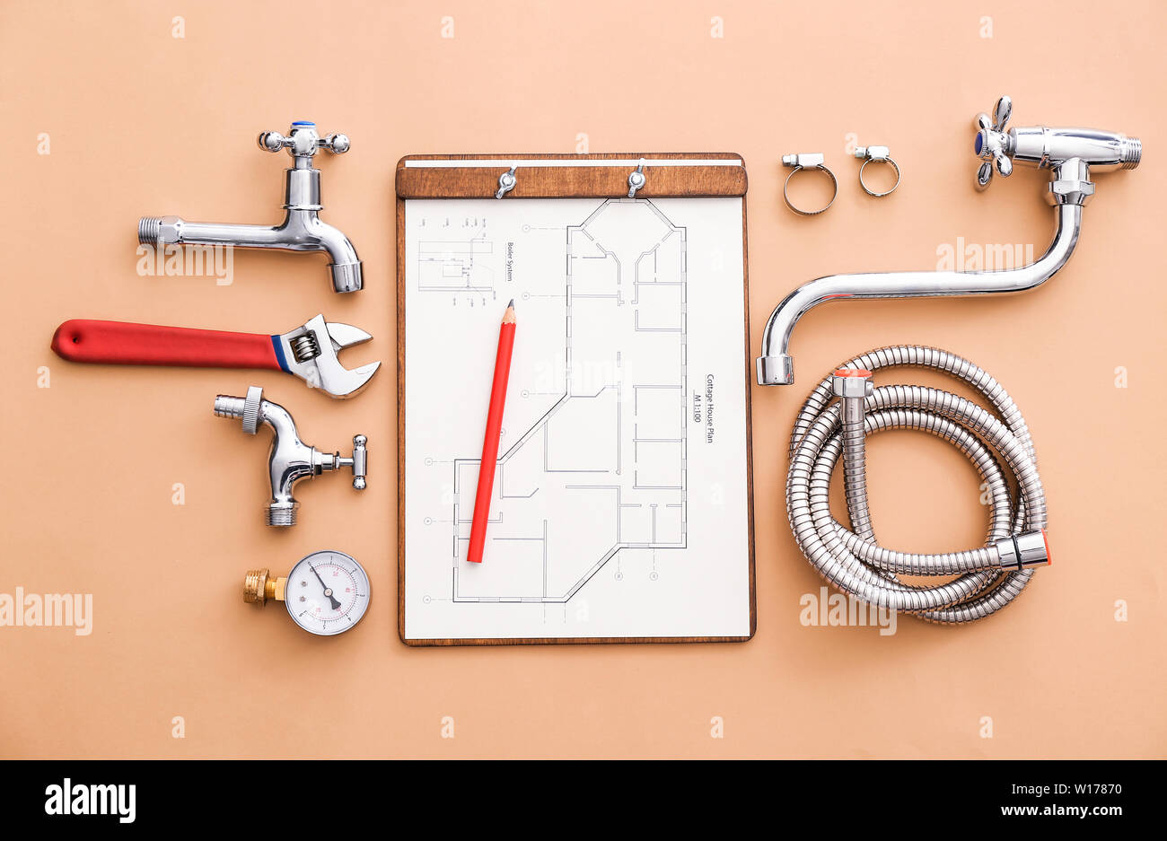 Set of plumbing items with house plan on color background Stock Photo ...