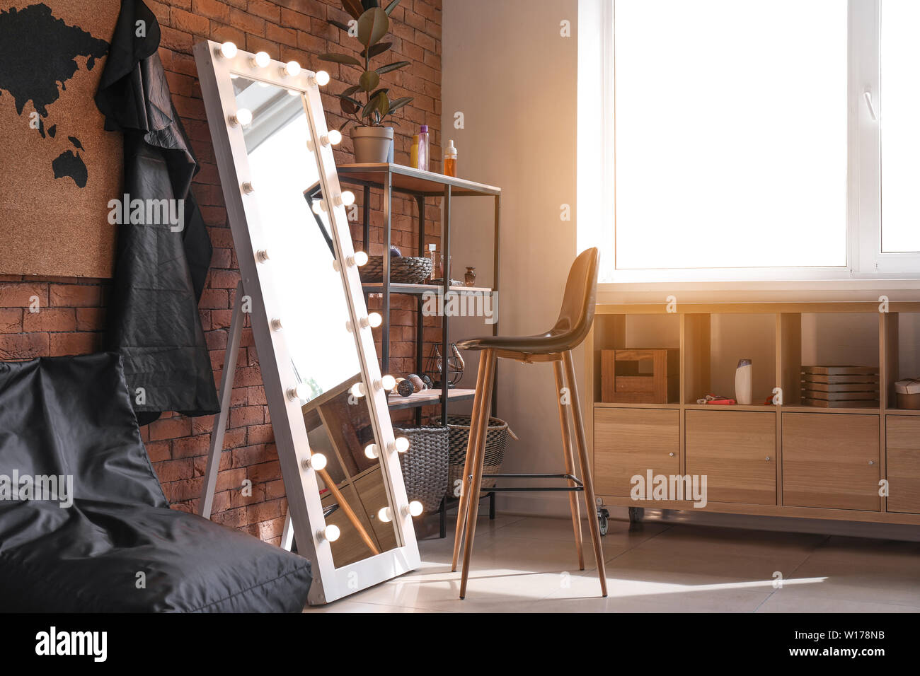 Interior of modern hairdressing salon Stock Photo - Alamy