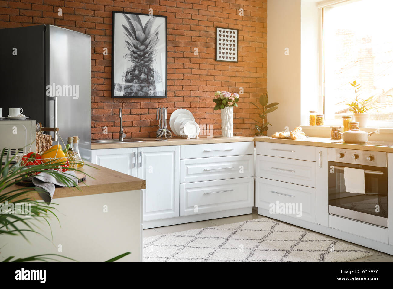 Interior of modern comfortable kitchen Stock Photo - Alamy
