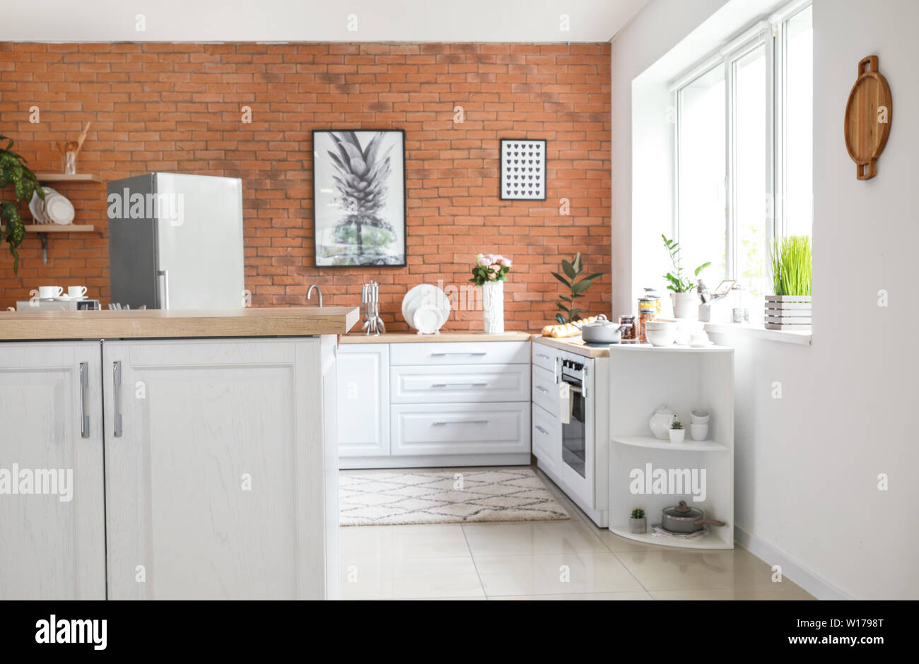 Interior of modern comfortable kitchen Stock Photo - Alamy
