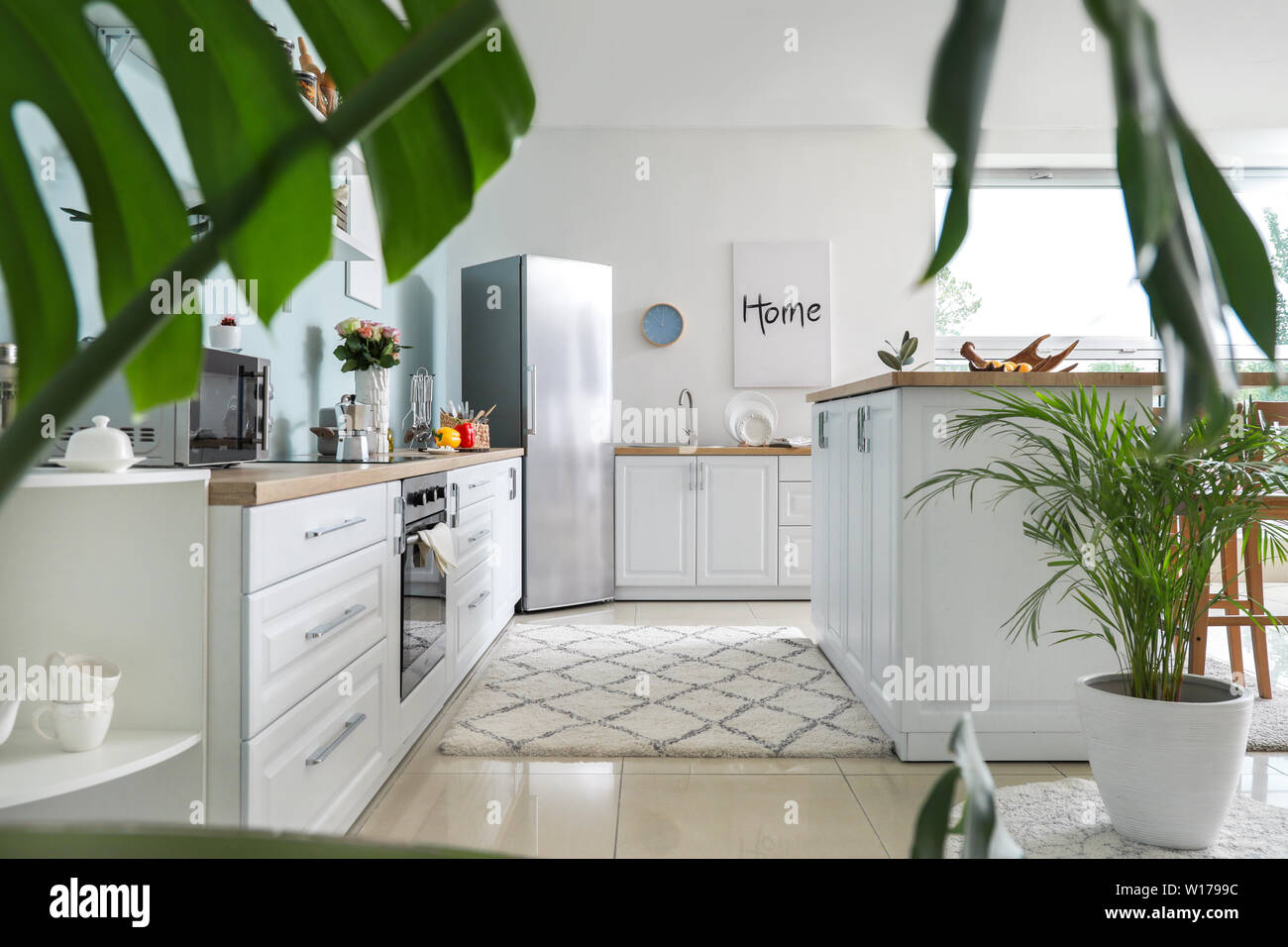 Interior of modern comfortable kitchen Stock Photo - Alamy