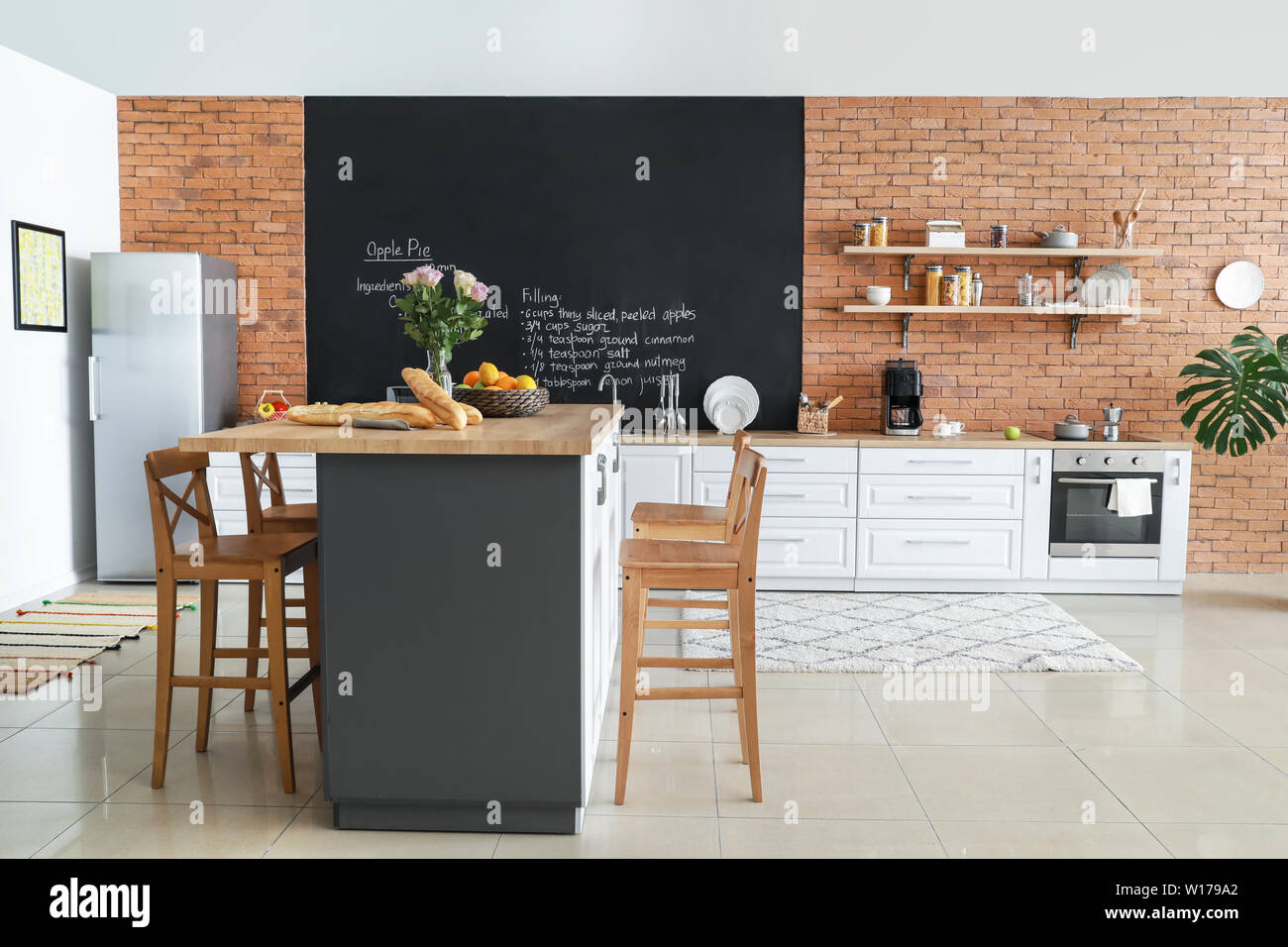 Interior of modern comfortable kitchen Stock Photo - Alamy
