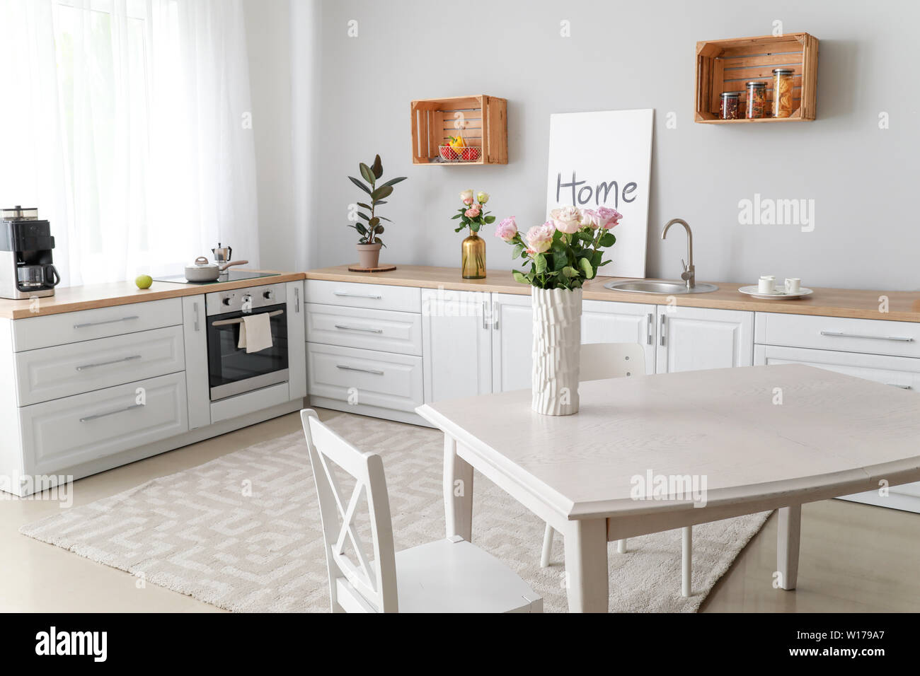 Interior of modern comfortable kitchen Stock Photo - Alamy