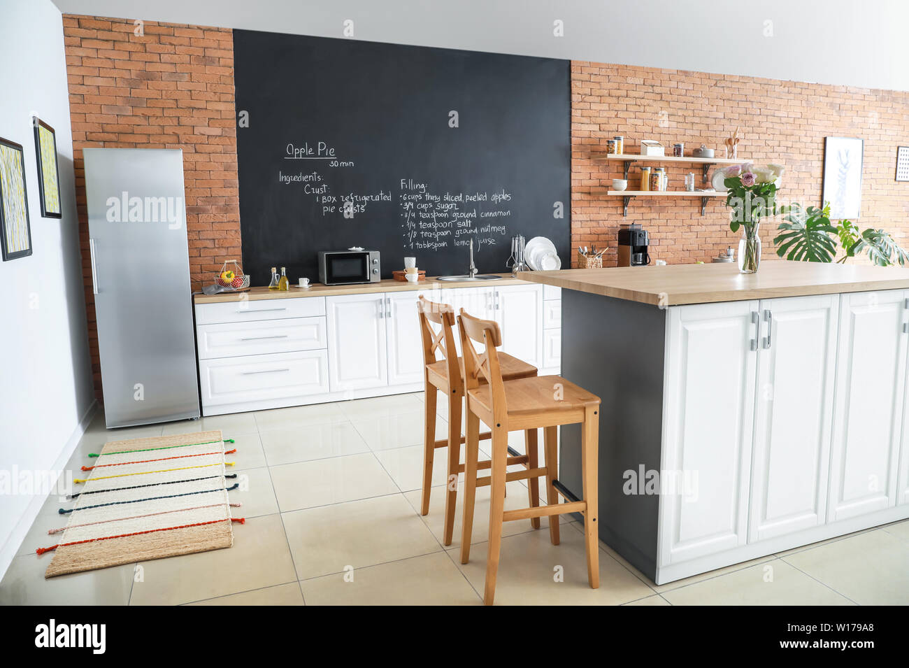 Interior of modern comfortable kitchen Stock Photo - Alamy