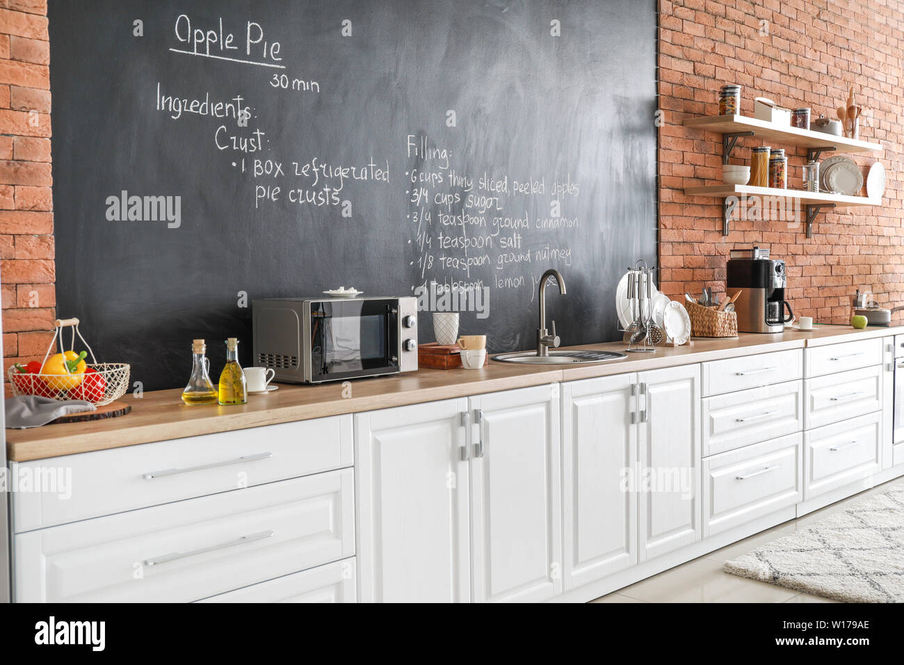 Interior of modern comfortable kitchen Stock Photo - Alamy