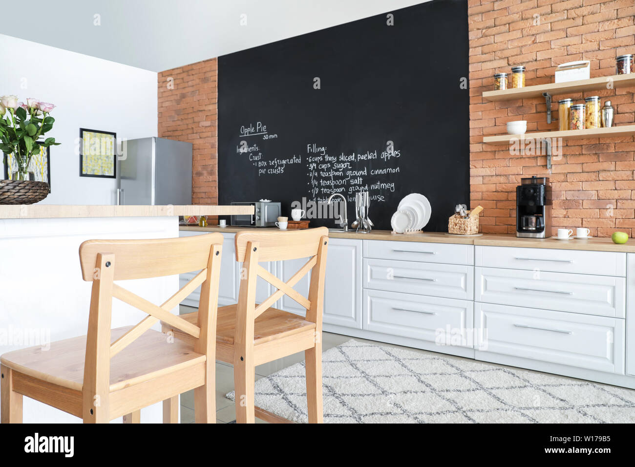 Interior of modern comfortable kitchen Stock Photo - Alamy