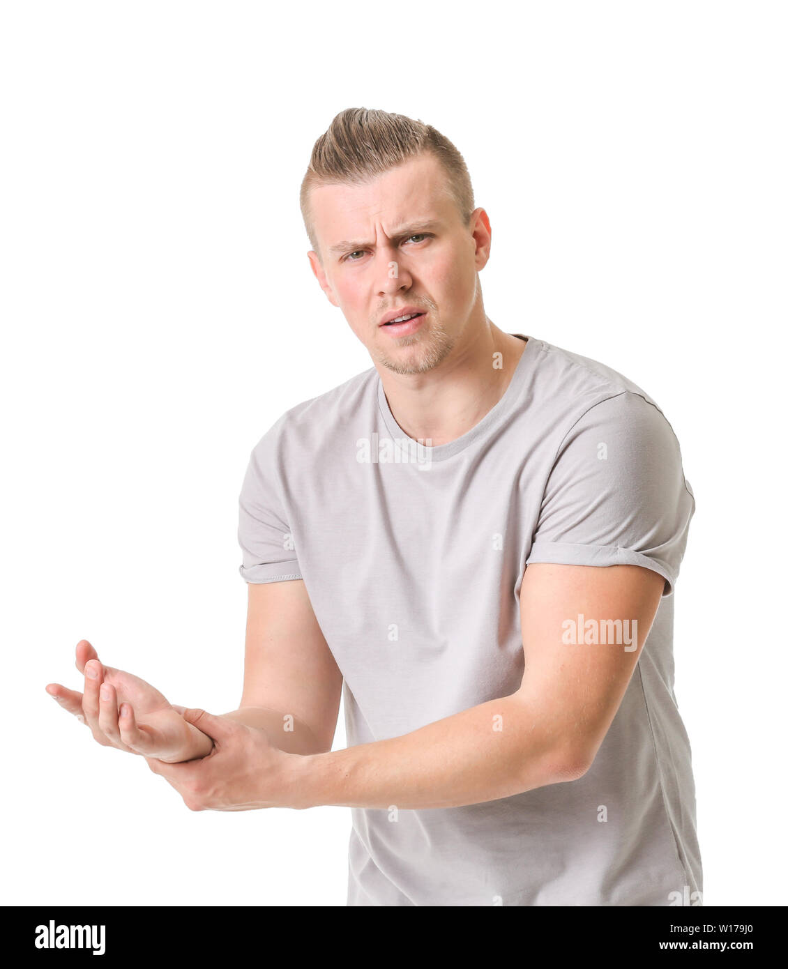 Man checking his pulse on white background Stock Photo - Alamy